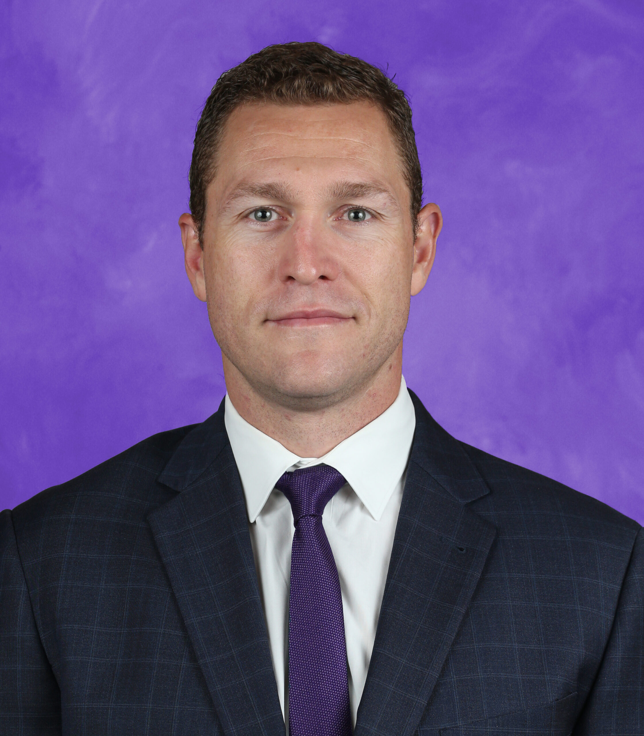 Carkner_Headshot-purple - Bungalower