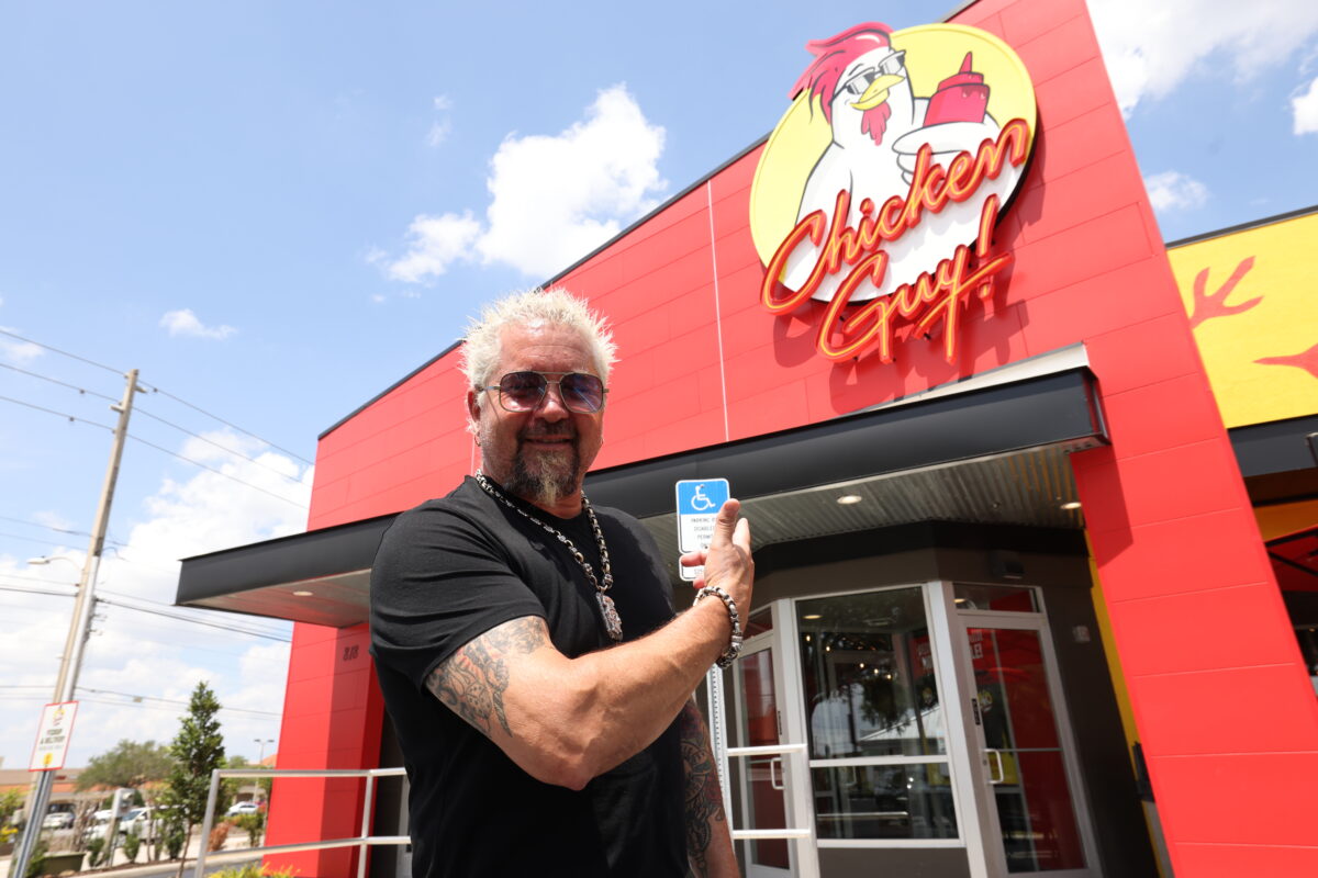 Guy Fieri standing outside Chicken Guy! Winter Park, the TV ...